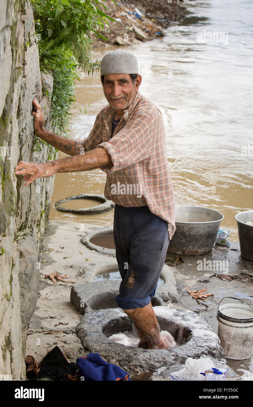 Man washing his feet hi-res stock photography and images - Alamy