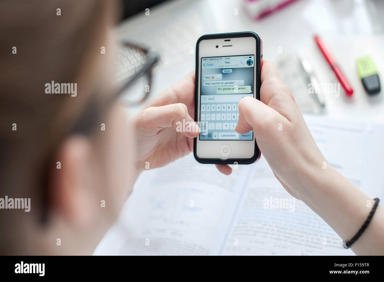 Hannover, Germany, cell phone use while learning Stock Photo - Alamy