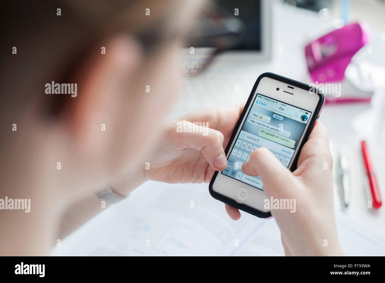 Hannover, Germany, cell phone use while learning Stock Photo - Alamy