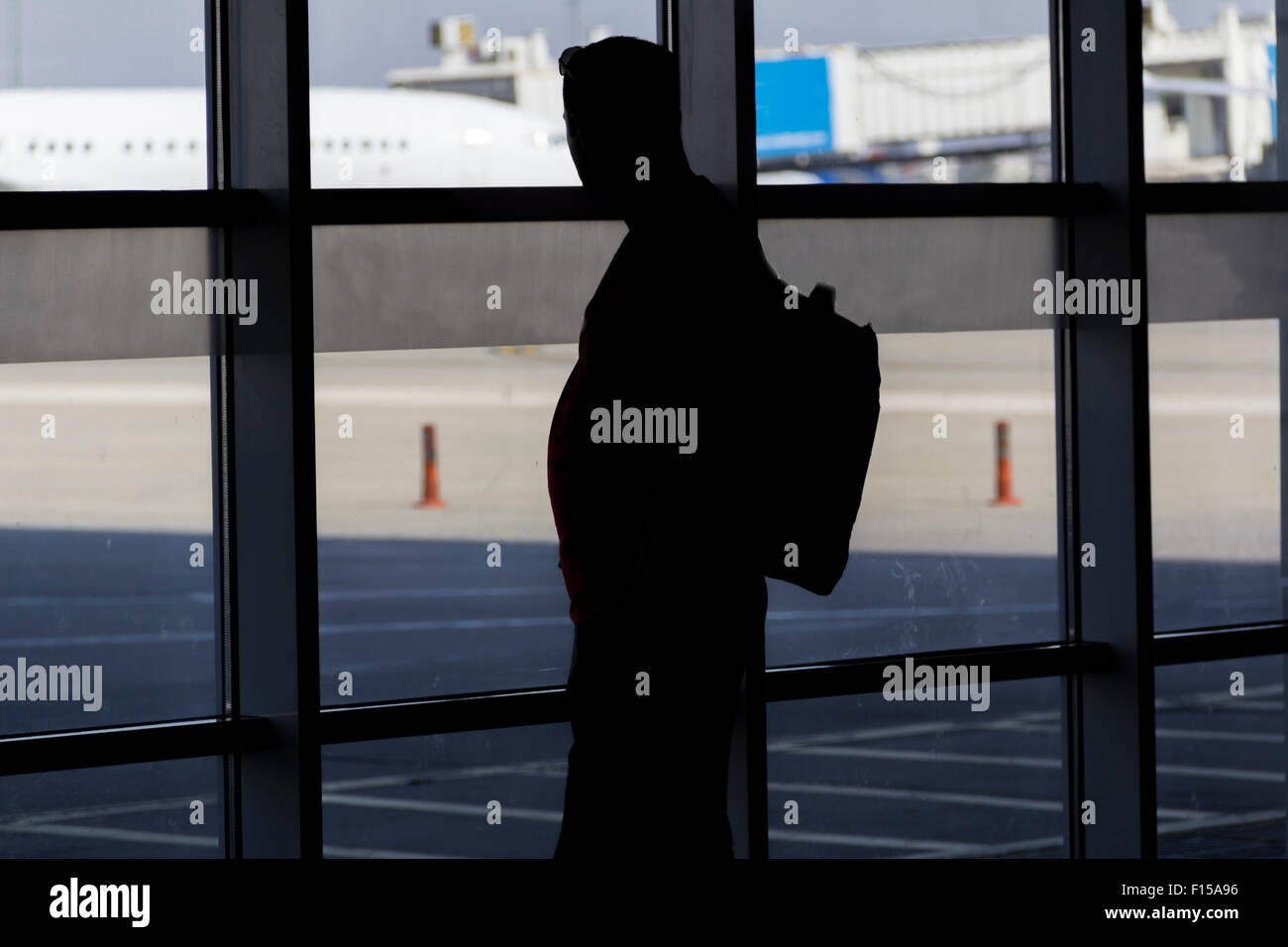 man silhouette waiting for boarding plane at airport Stock Photo - Alamy