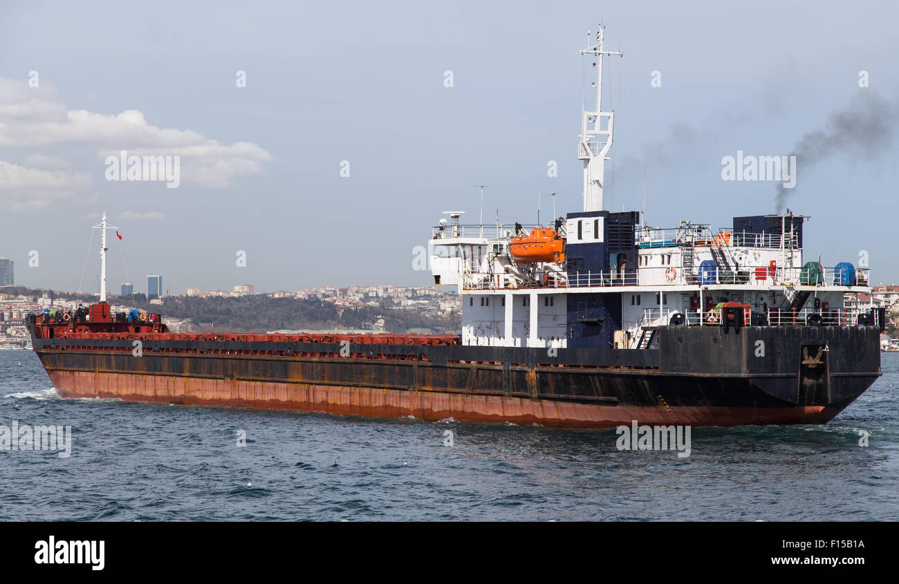 A cargo ship carrying goods between ports Stock Photo - Alamy