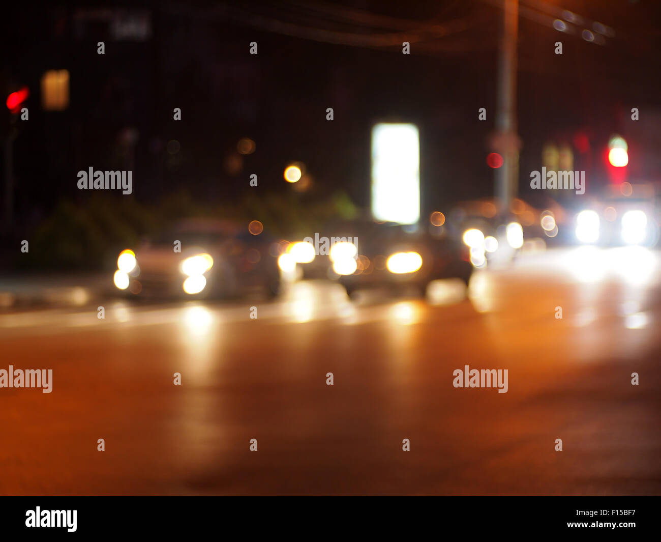 Defocused car, the lights from the headlights and tail lights of cars ...
