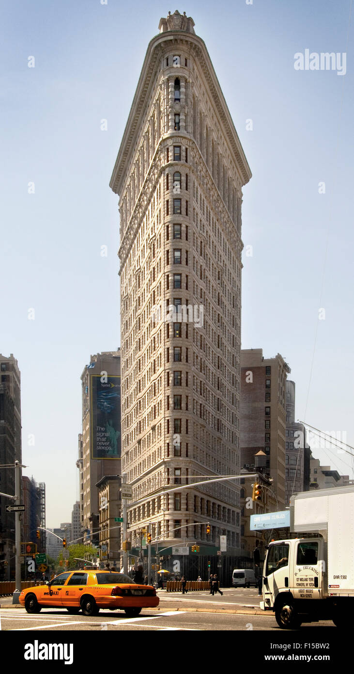 Urban scene with the Flatiron building on the background in New York ...