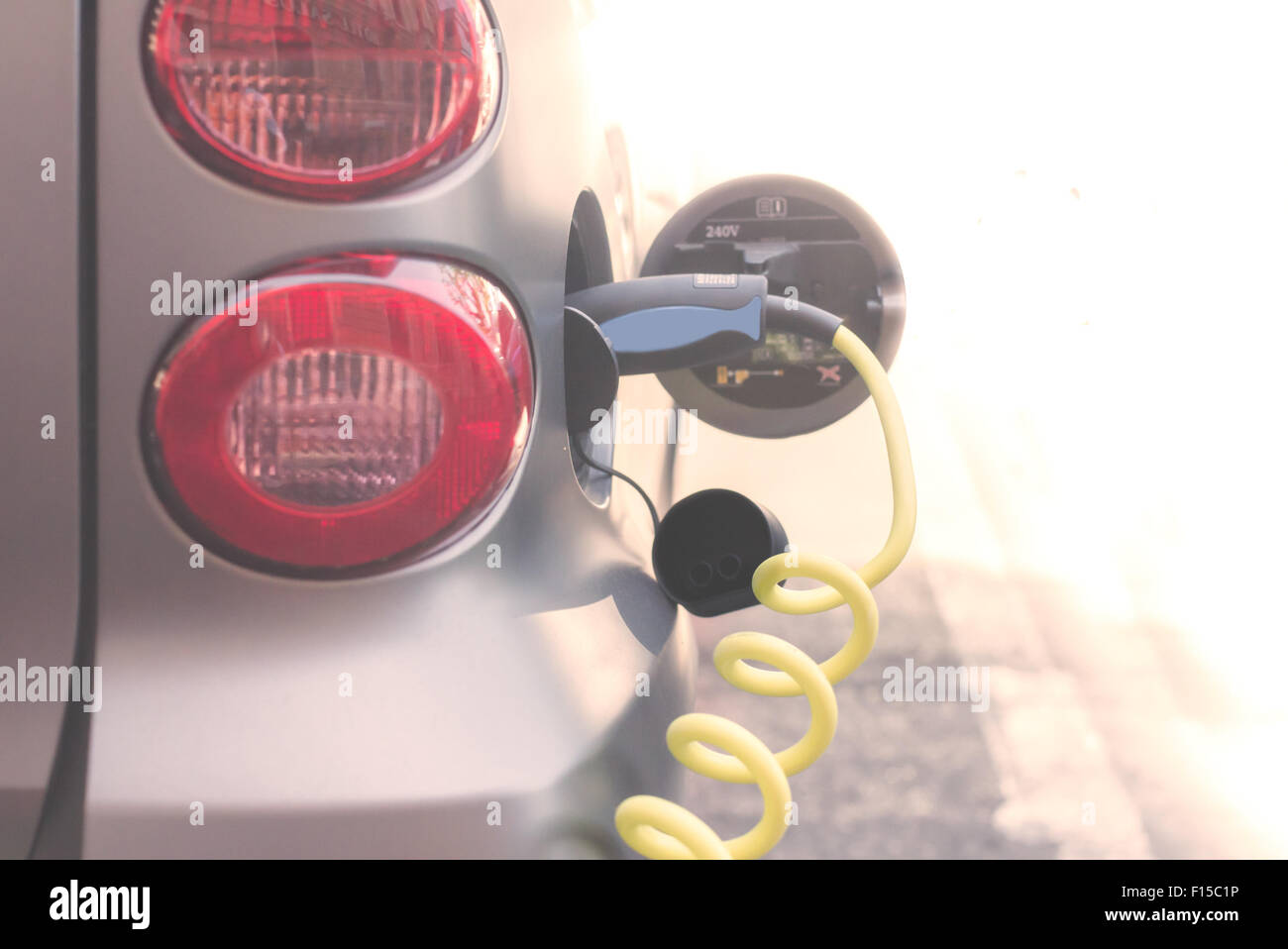 Electric Car recharging Stock Photo - Alamy