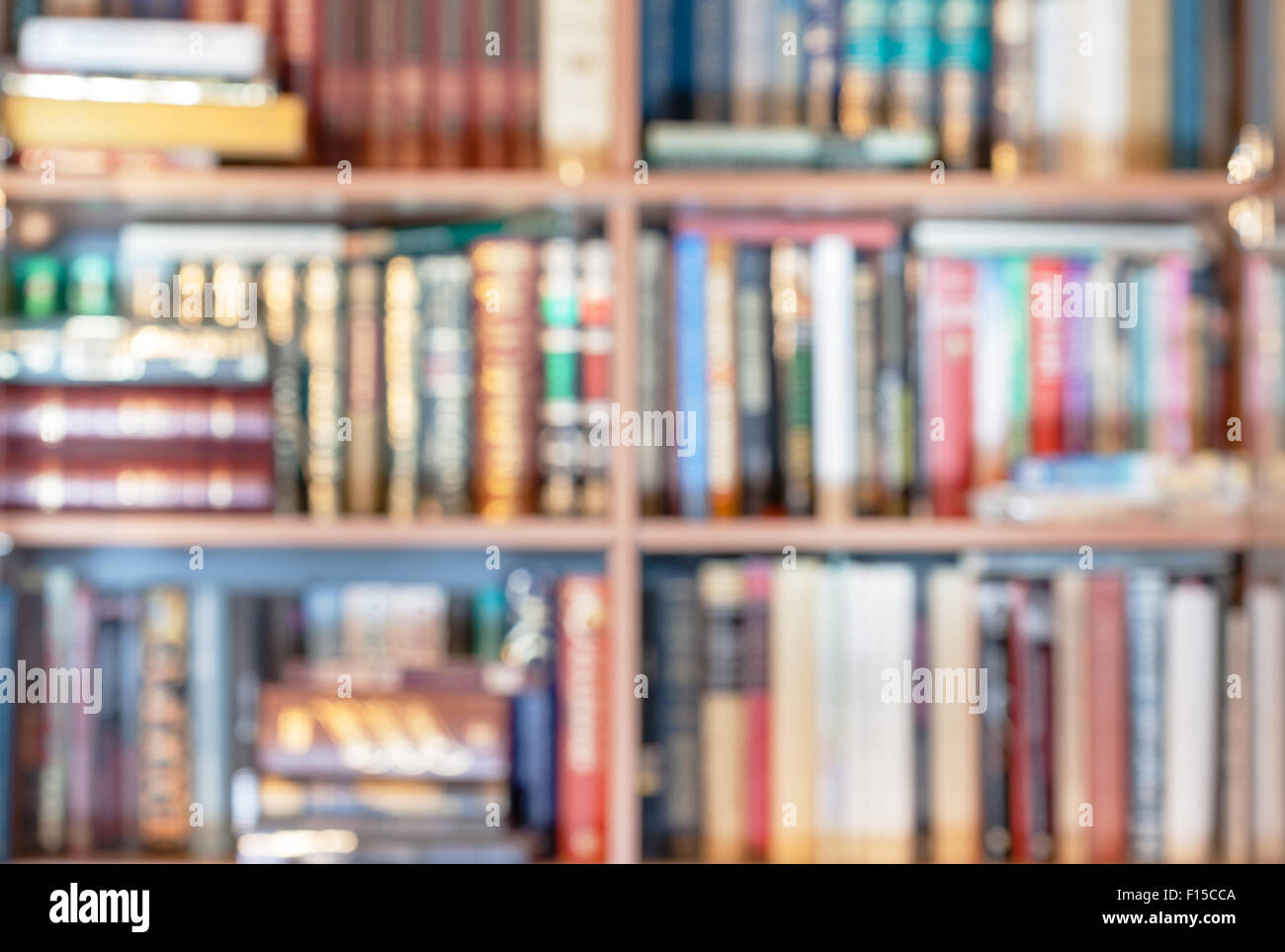 blurred background from many books in library Stock Photo - Alamy