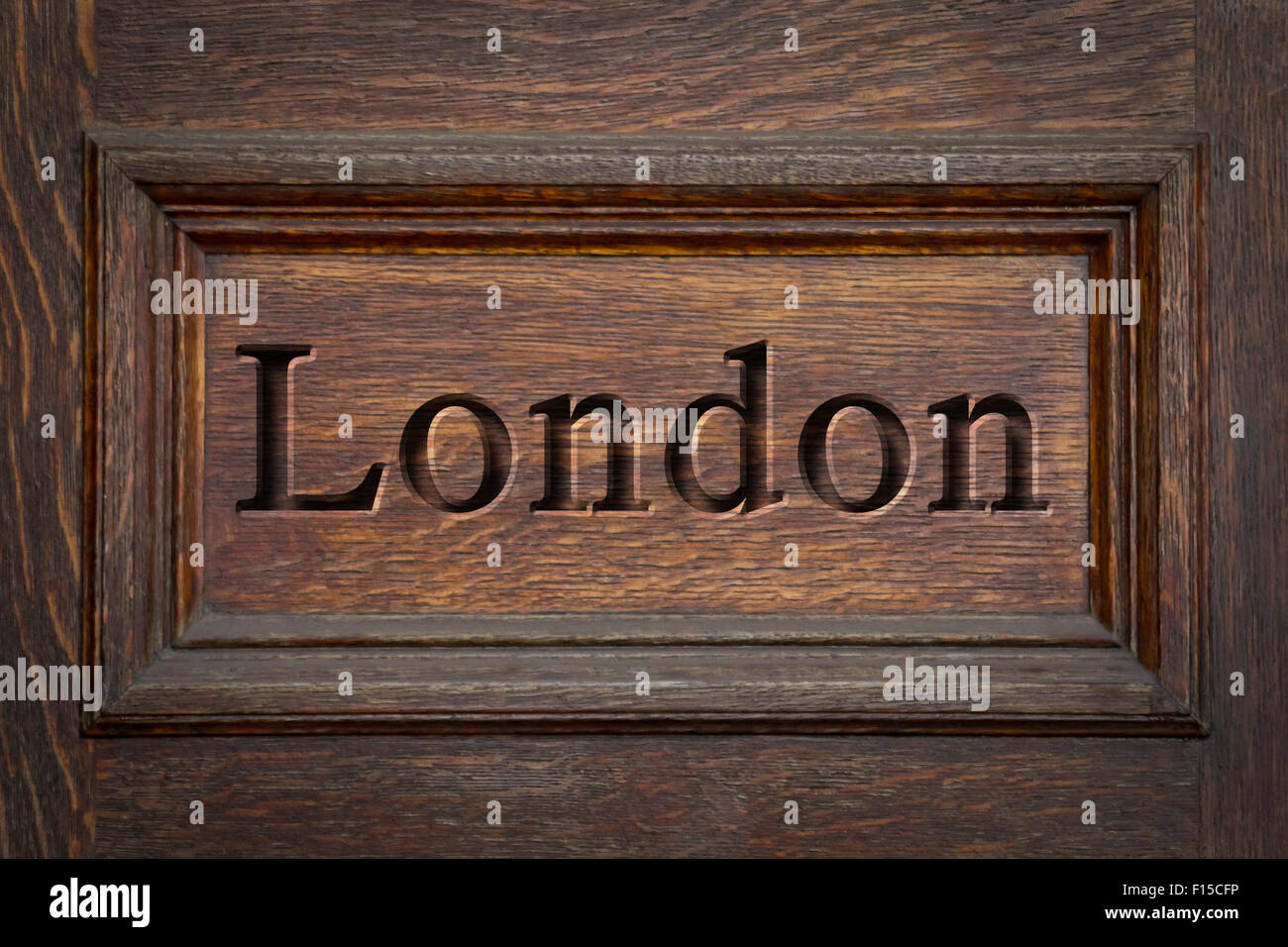 Engraving spelling the city London on textured old surface Stock Photo ...