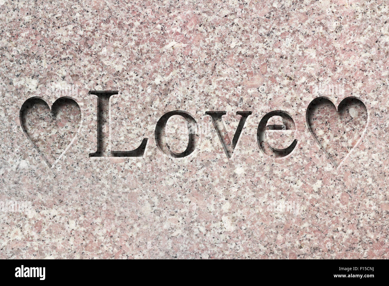 Engraving spelling the word Love on textured old surface Stock Photo ...