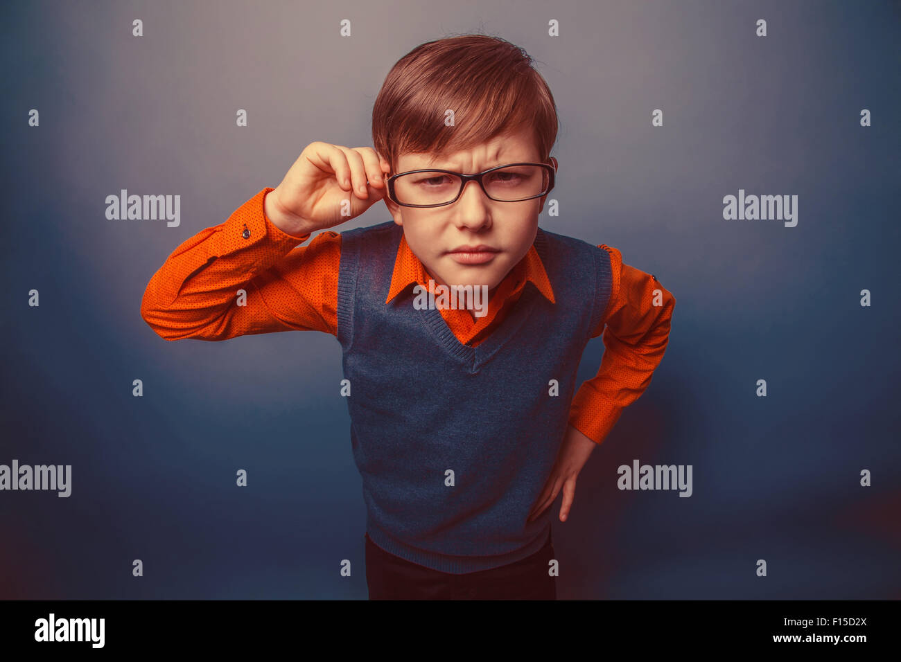 European-looking boy of ten years in glasses, anger, resentment Stock ...