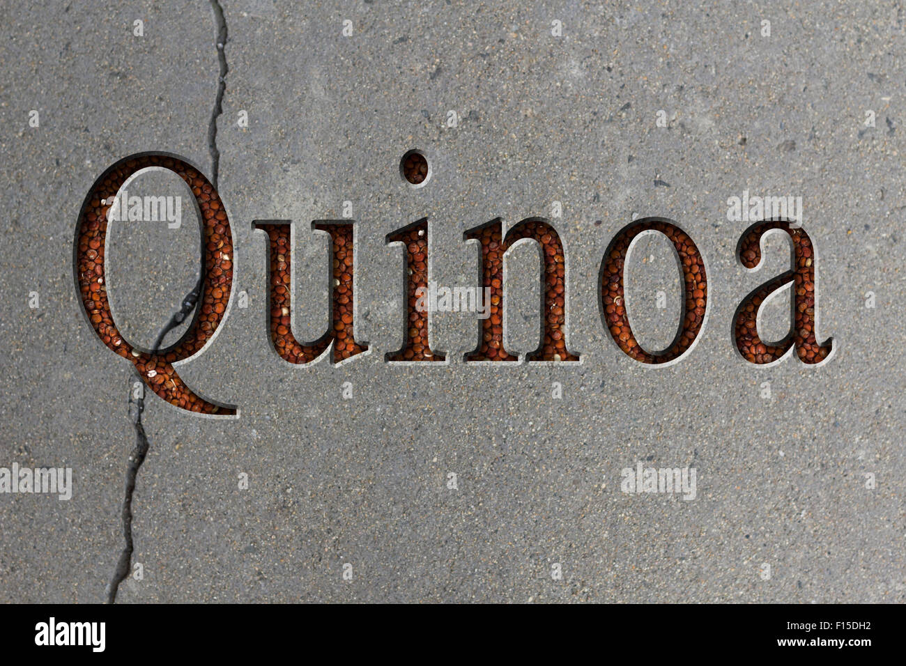 Text engraving word quinoa with quinoa grains filling up the engraving ...