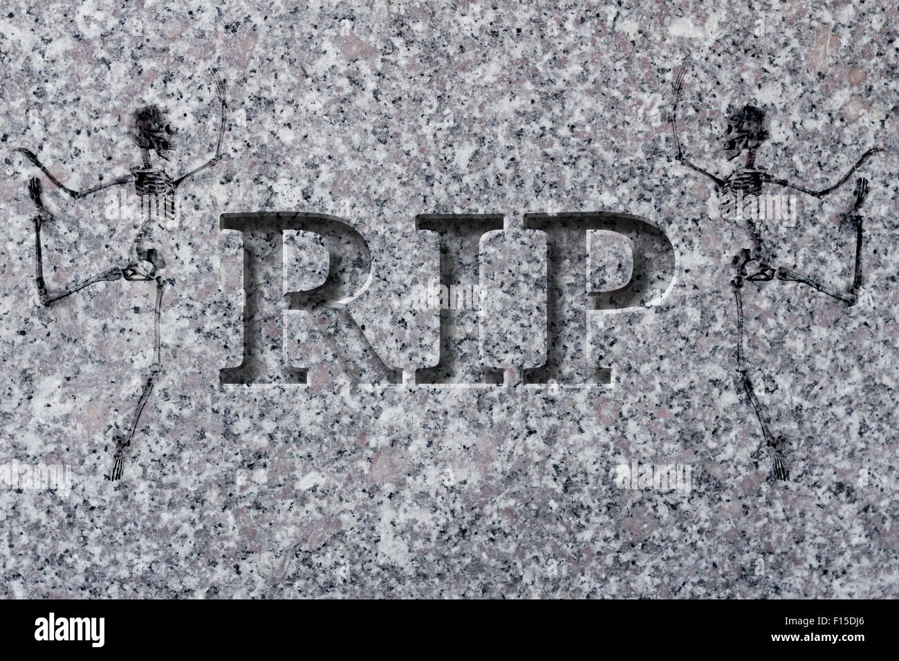 Engraved headstone spelling the letters RIP with Skeletons - rest in ...