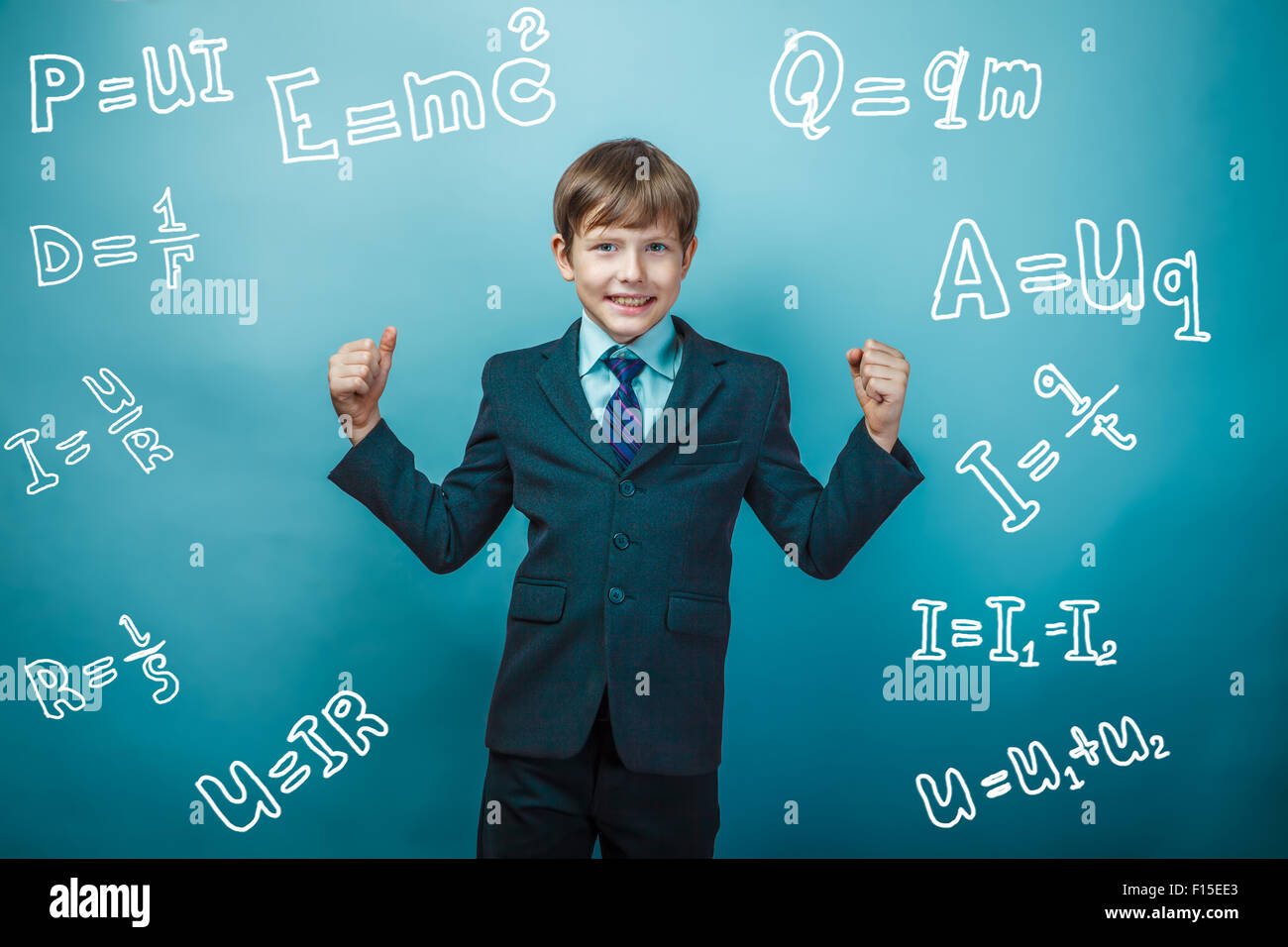 Teen boy genius gesture joy physics formulas around the photo st Stock ...