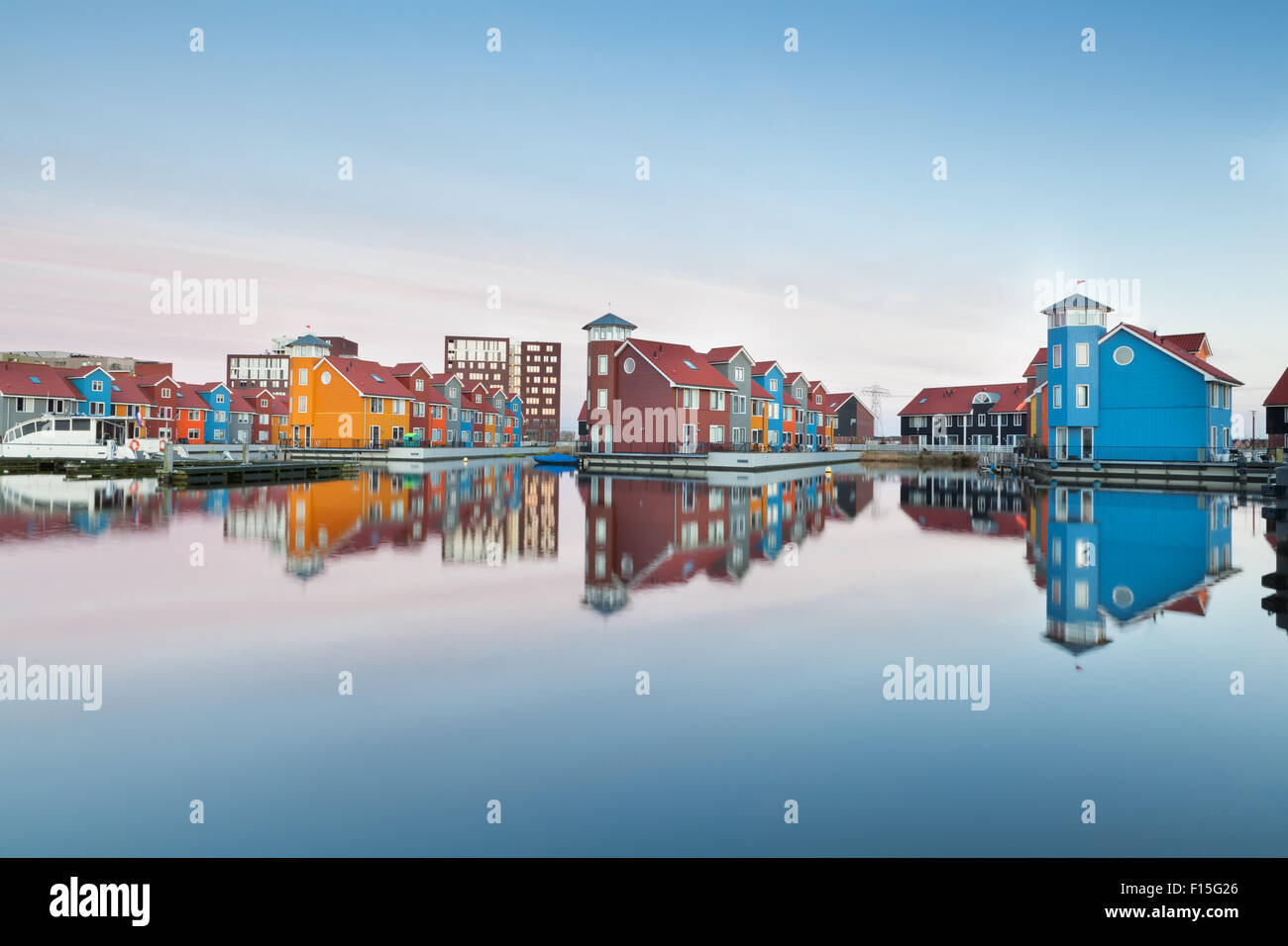 colorful buildings on water at haven, Groningen, Netherlands Stock ...