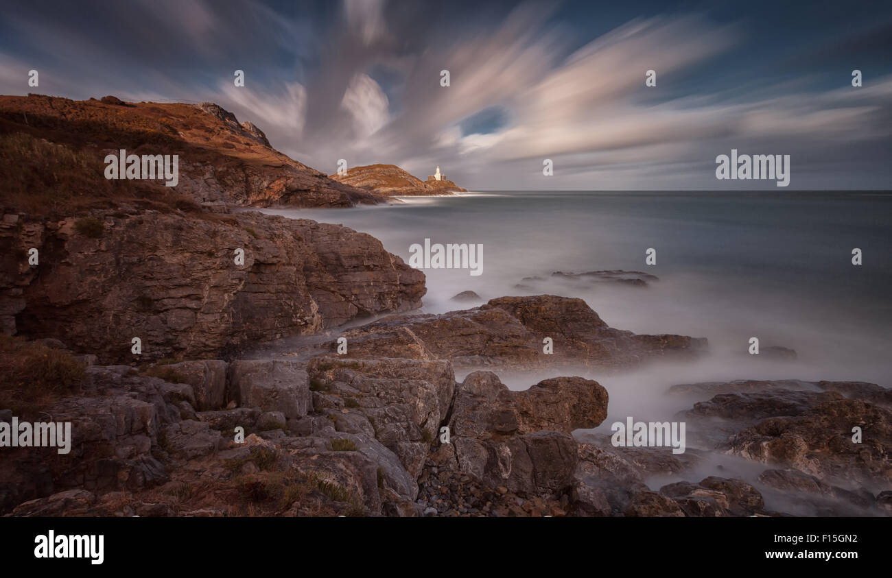 Mumbles lighthouse from Bracelet Bay on the Gower peninsular Stock ...