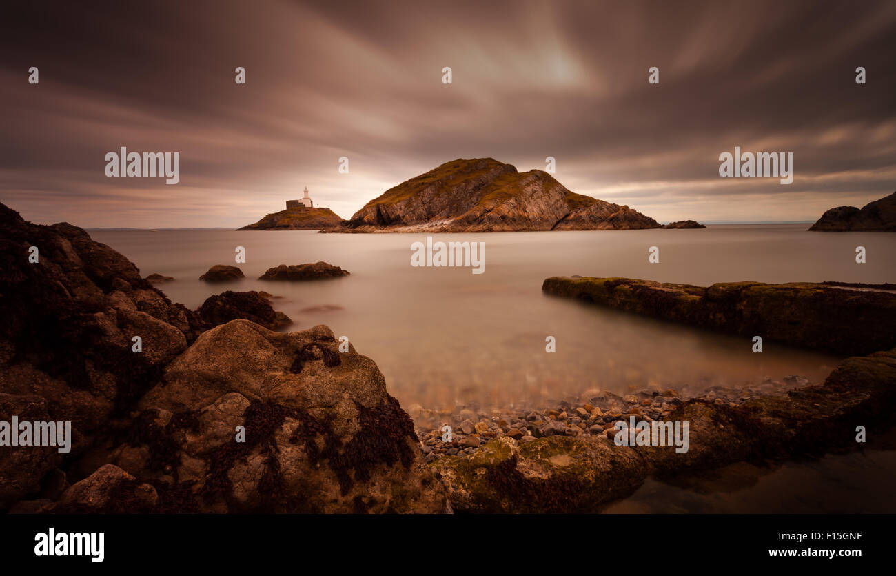 The iconic structure in Swansea Bay, the Mumbles lighthouse Stock Photo ...