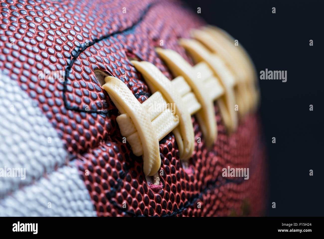 Close-up of football with seams Stock Photo - Alamy