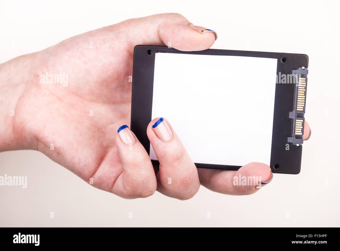 Hdd disk on female hand hi-res stock photography and images - Alamy
