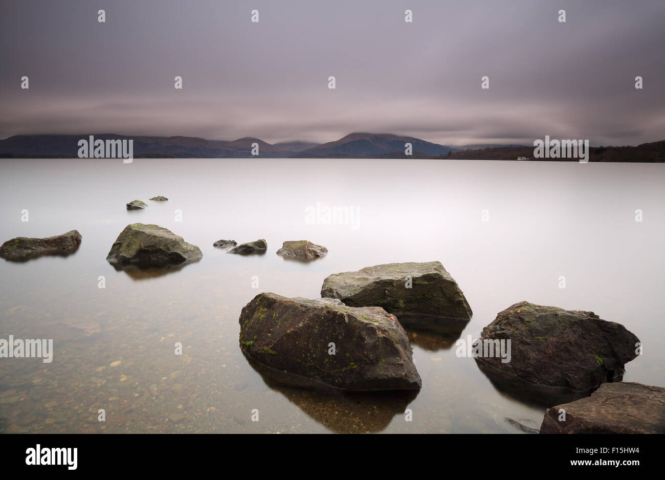 Loch Lomond at Sunset with Arrochar Alps across the water Stock Photo ...