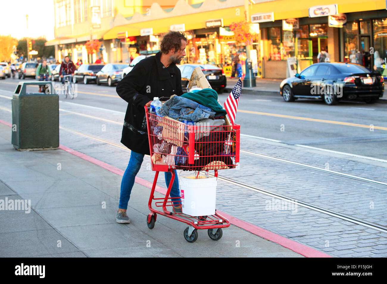 Homeless man shopping cart hi-res stock photography and images - Alamy