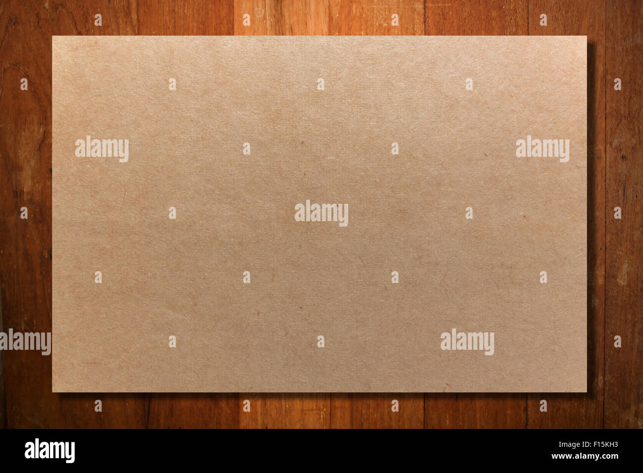 Crumpled paper on wood wall Stock Photo - Alamy