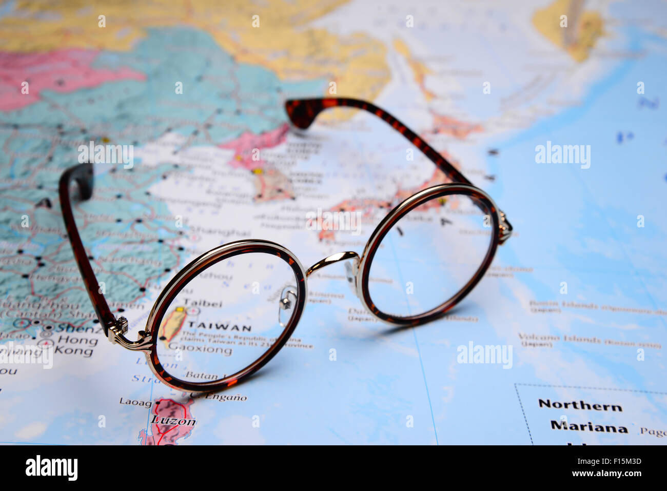 Glasses on a map of Asia - Taiwan Stock Photo - Alamy