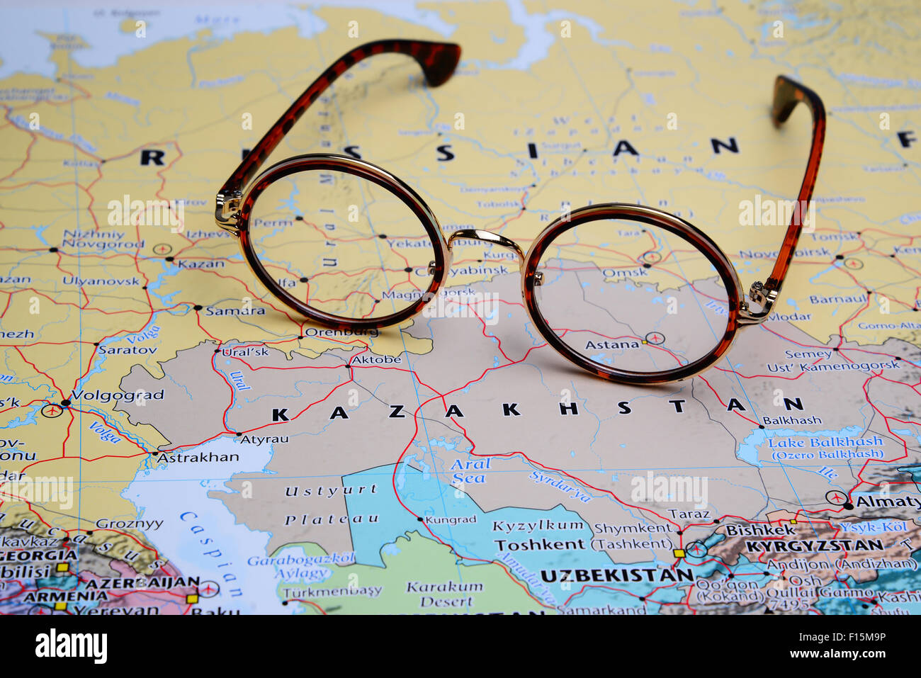 Glasses on a map of Asia - Astana Stock Photo - Alamy