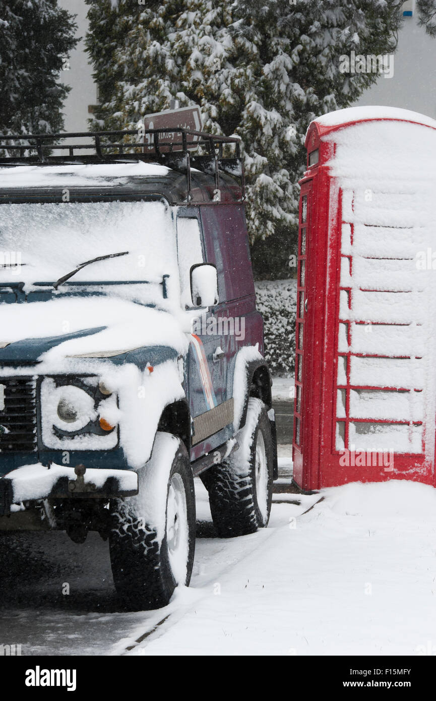 Two British icons covered in white snow - Land Rover Defender 90 parked ...