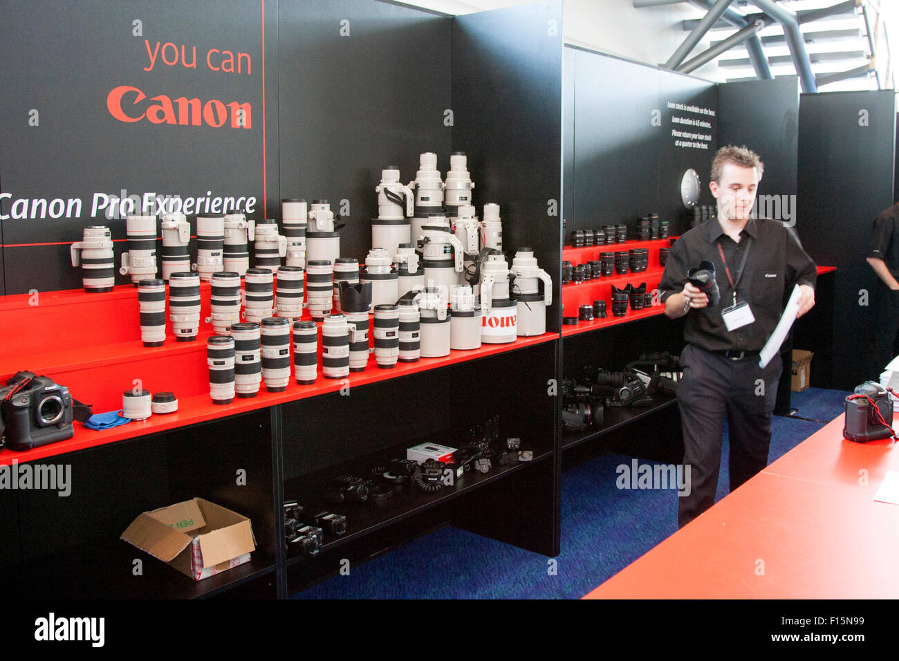 White Canon EF L series lenses and 1d camera bodies Stock Photo - Alamy