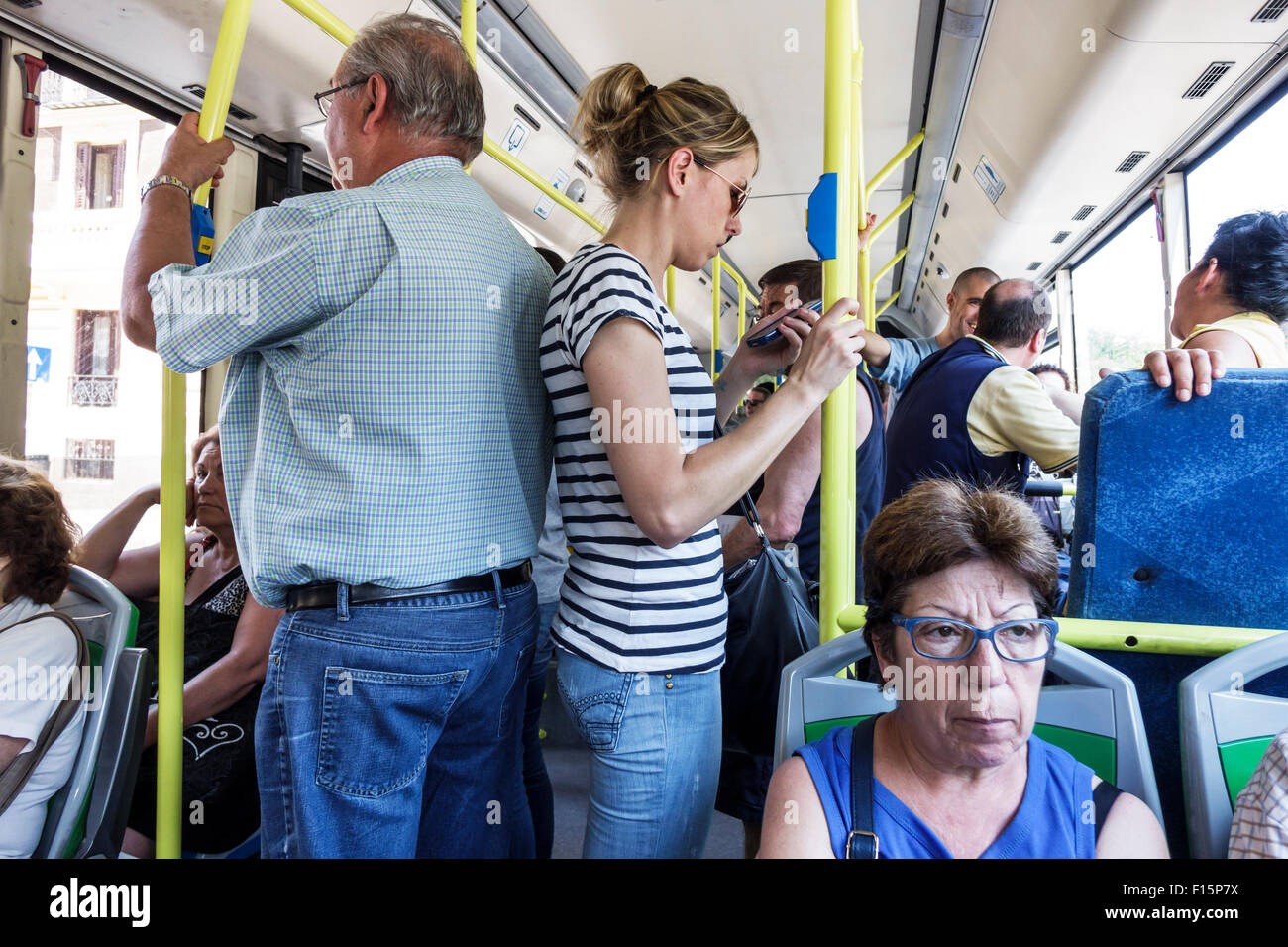Madrid Spain,Hispanic Metro EMT,bus,riders,passenger passengers rider ...