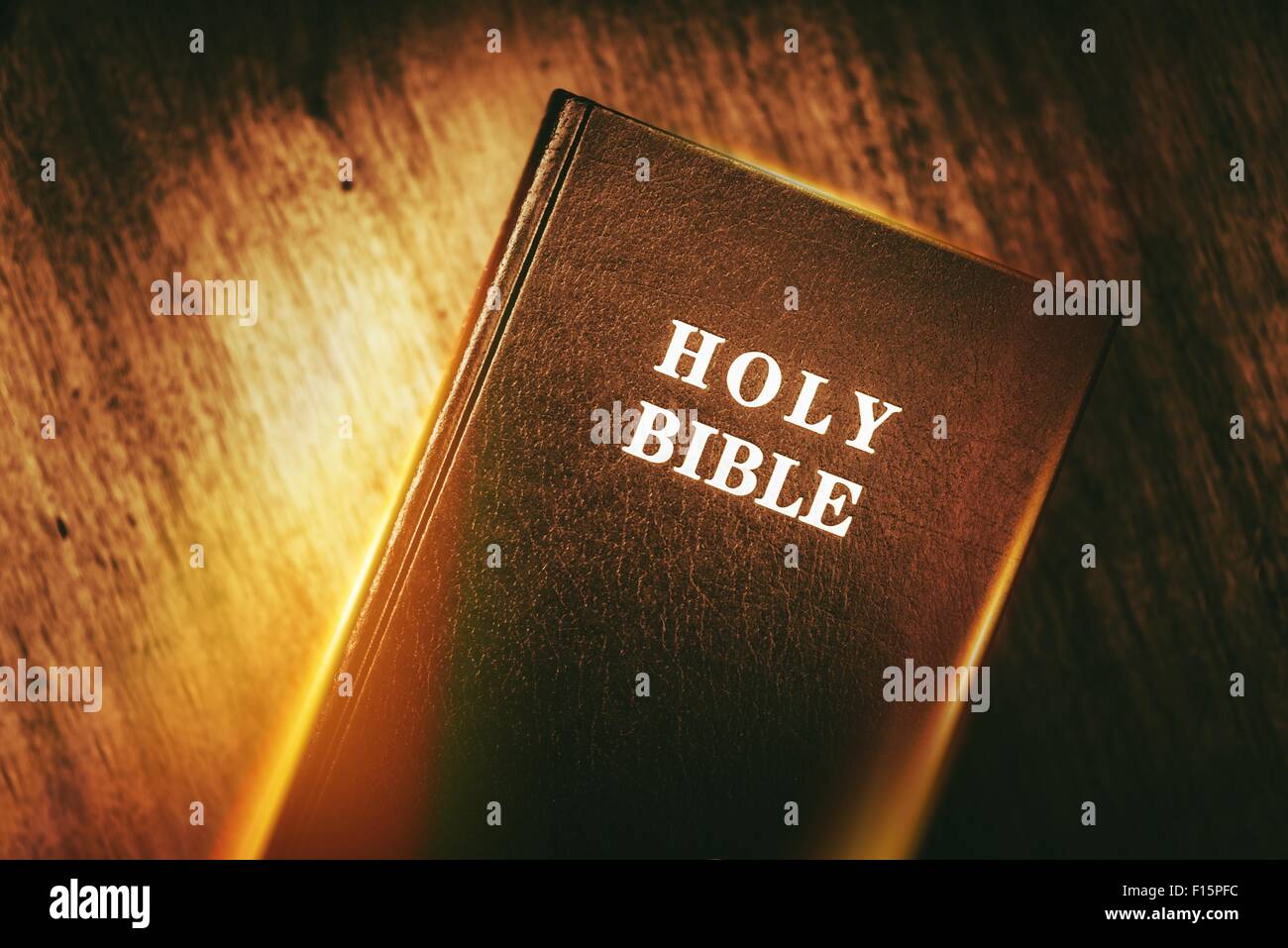 Holy Bible in Dark Browny Vintage Color Grading. Glowing Light Holy ...