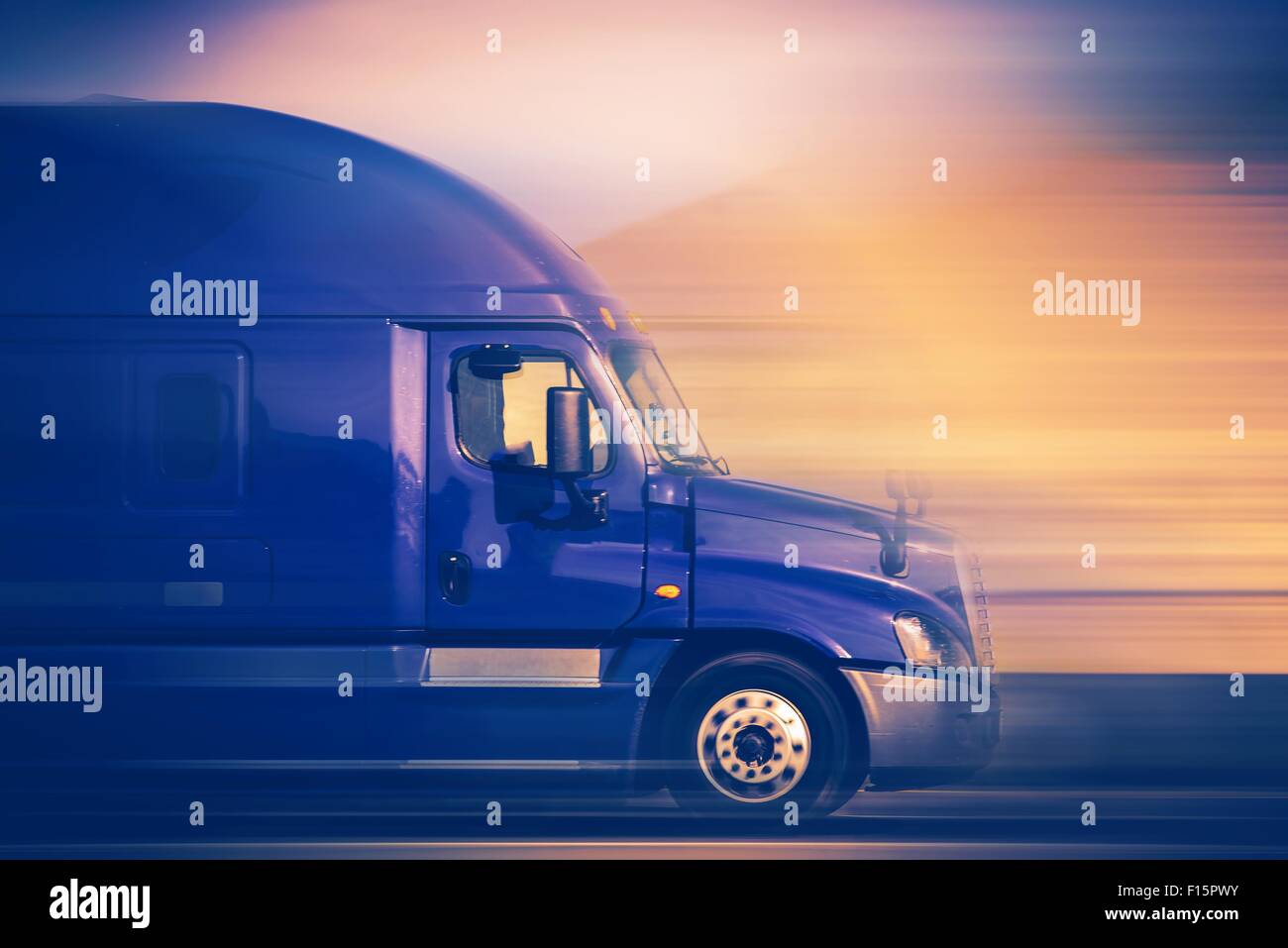 Rush Trucking. Speeding Blue Semi Truck on the American Highway ...