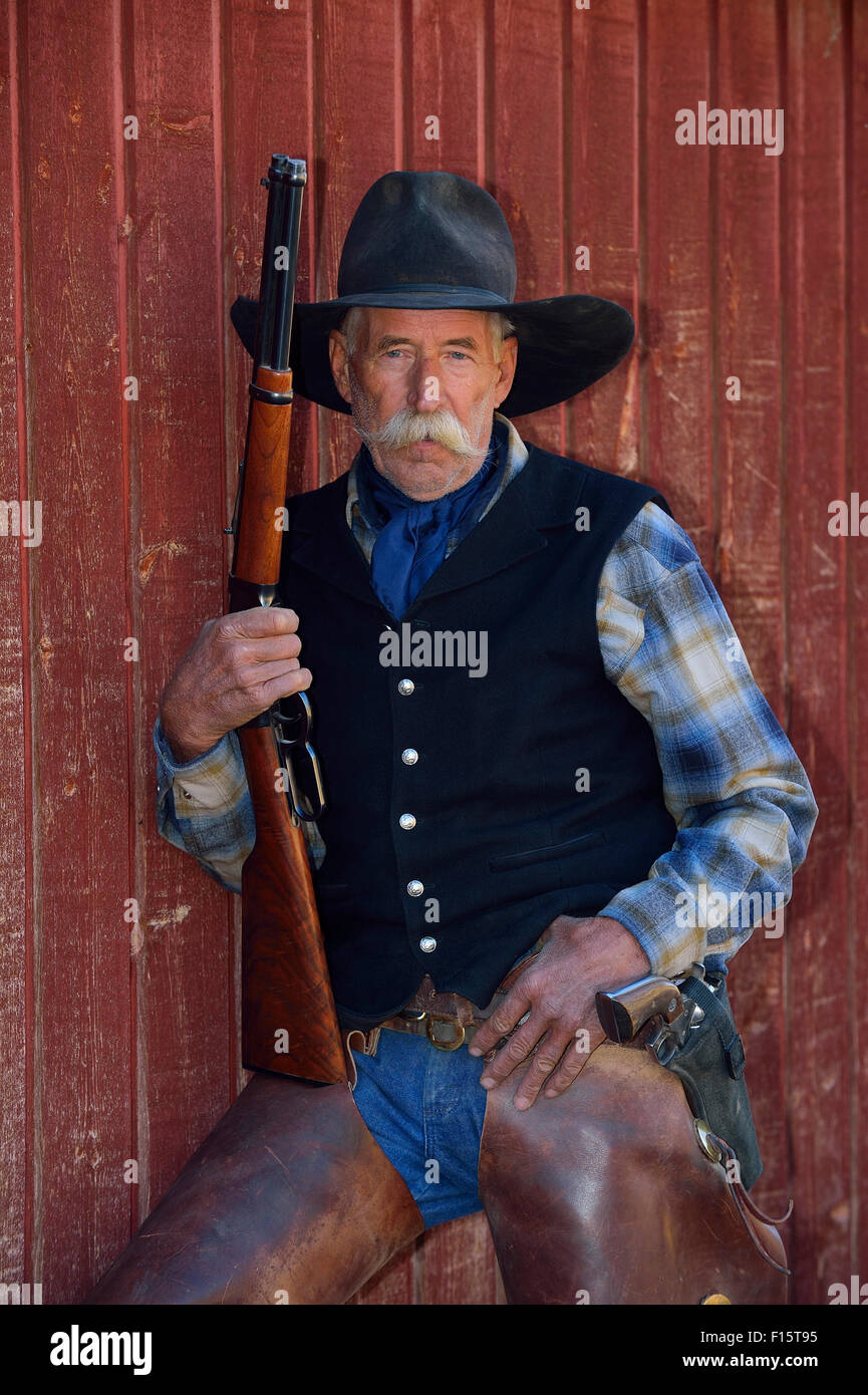 Portrait of Cowboy with Rifle, Shell, Wyoming, USA Stock Photo - Alamy