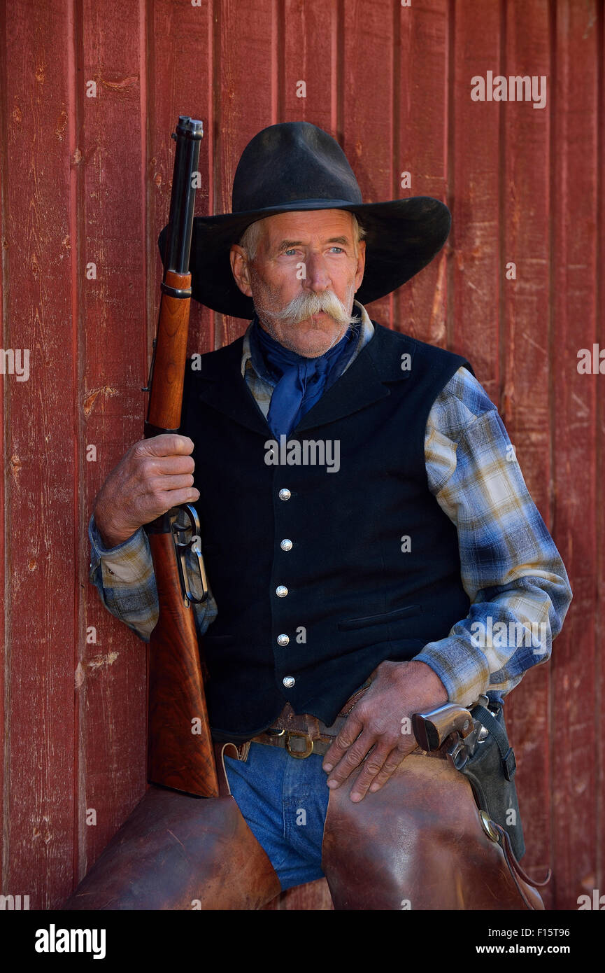 Man cowboy rifle hi-res stock photography and images - Alamy