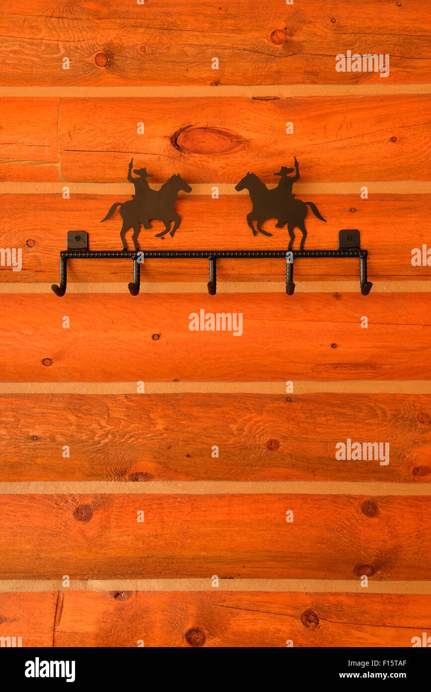 Coat Hooks with Cowboy Motif, Wyoming, USA Stock Photo - Alamy