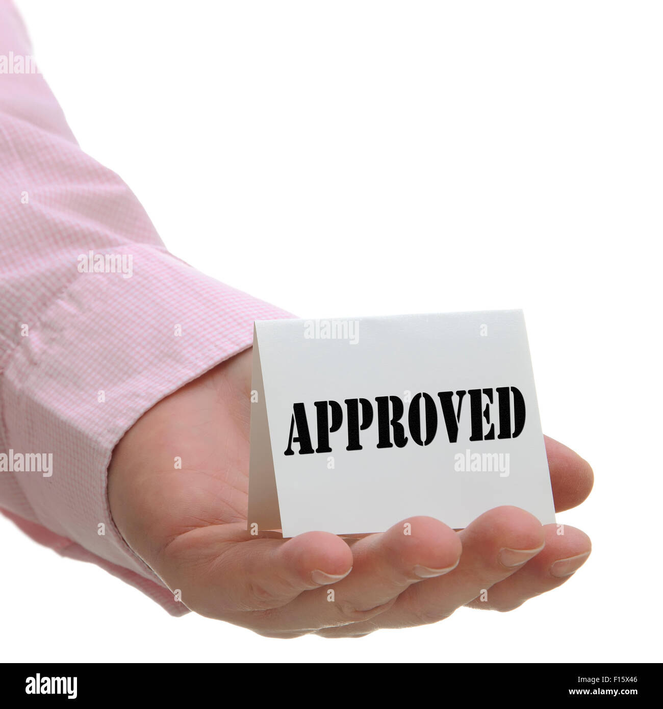 Business man holding approved sign on hand Stock Photo - Alamy