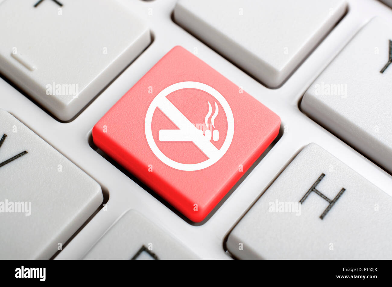Red no smoking key on keyboard Stock Photo - Alamy
