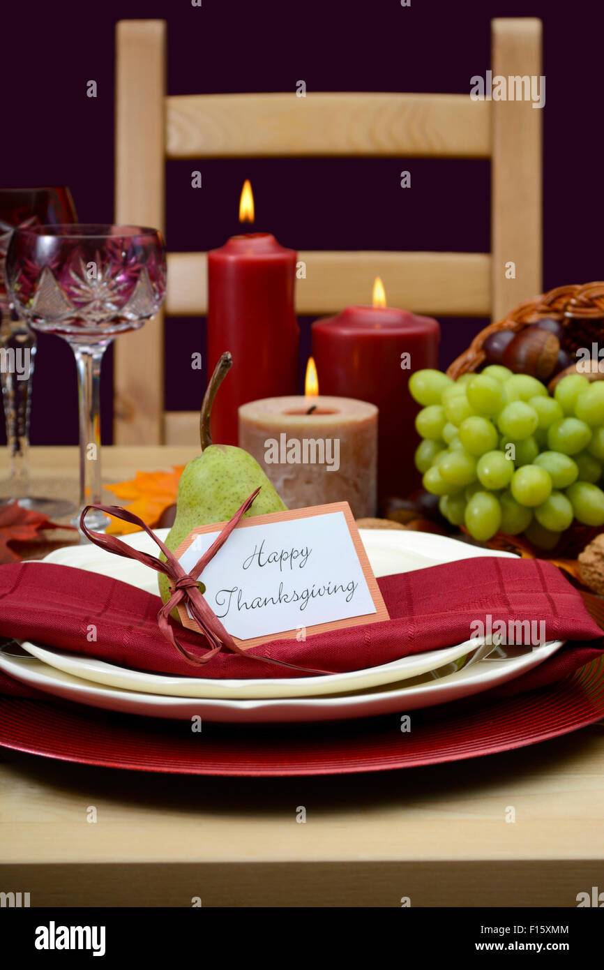 Happy Thanksgiving table setting in classic rustic colors on wood table ...