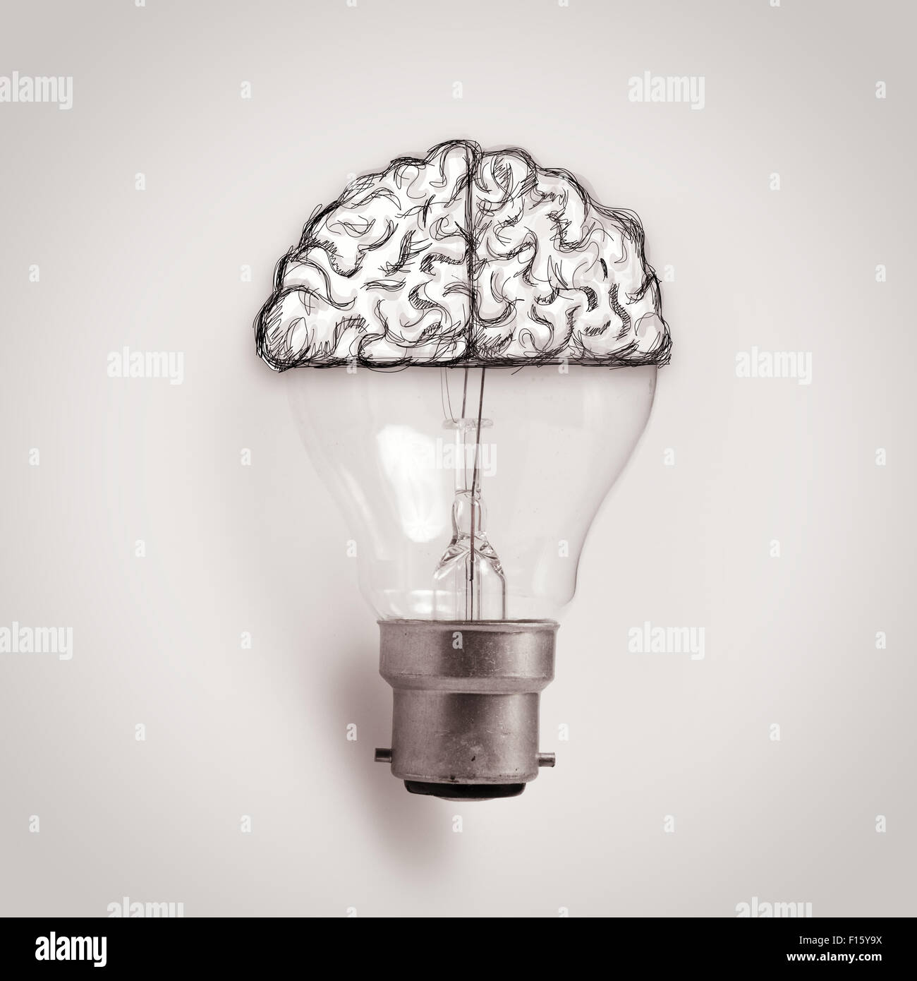 Light bulb with hand drawn brain as creative idea concept Stock Photo ...