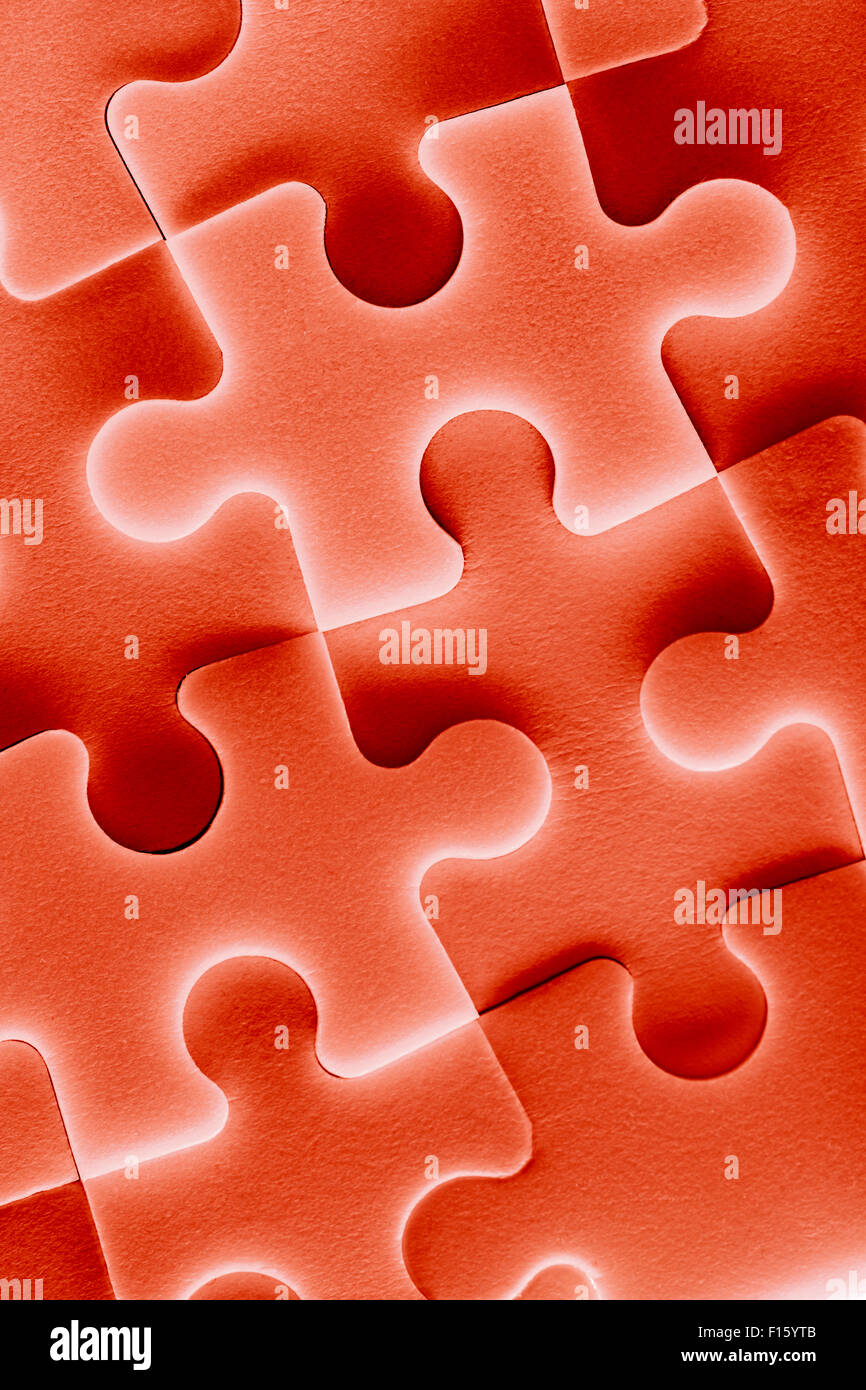 Jigsaw puzzle pieces as background in closeup Stock Photo - Alamy