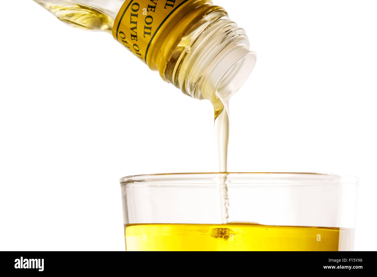 Pouring from bottle glass splash hi-res stock photography and images ...