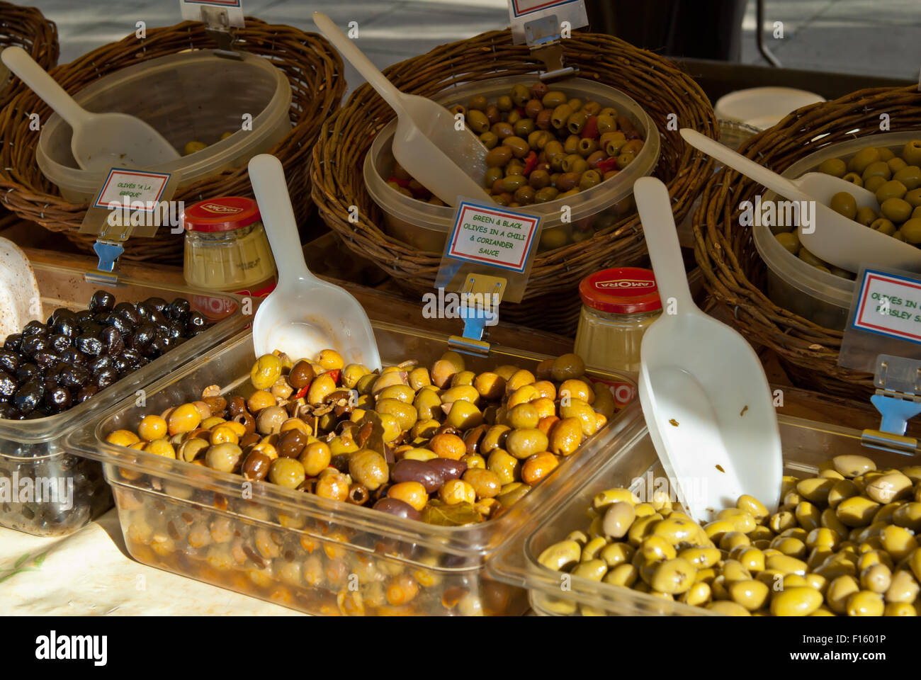 Assorted Olive's displayed for sale on market stall Stock Photo - Alamy