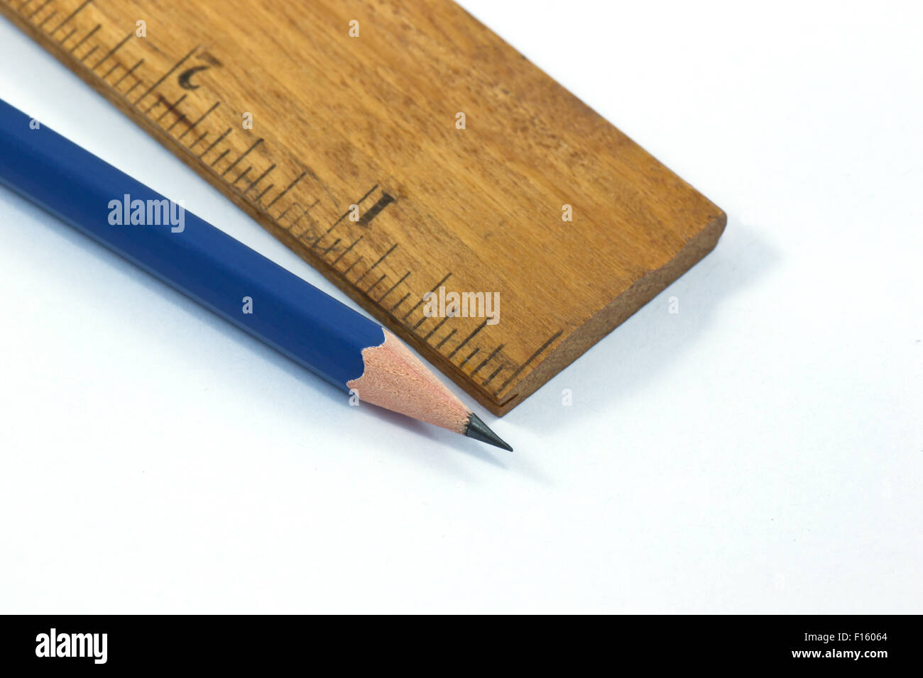 Ruler and pencil isolated on white background Stock Photo - Alamy