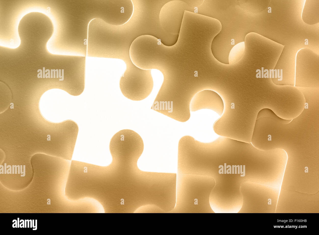 Background of large shining puzzles in brown Stock Photo - Alamy