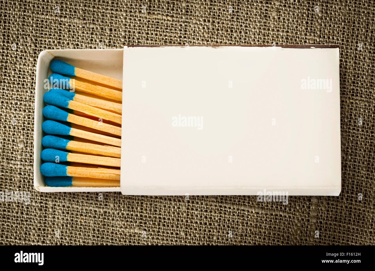 Blank box of blue matches in it Stock Photo - Alamy
