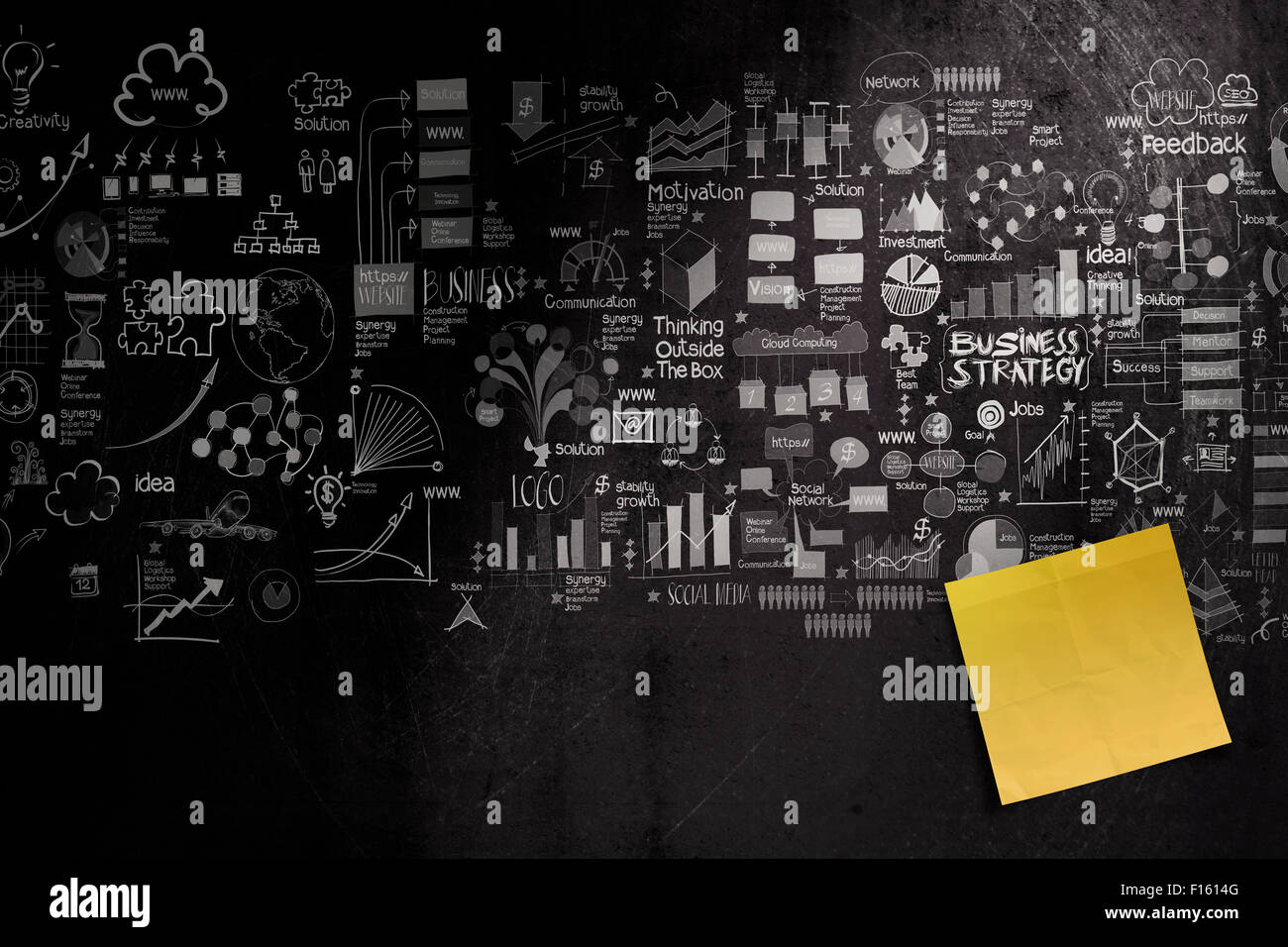 blank sticky note on hand drawn business strategy background as concept ...