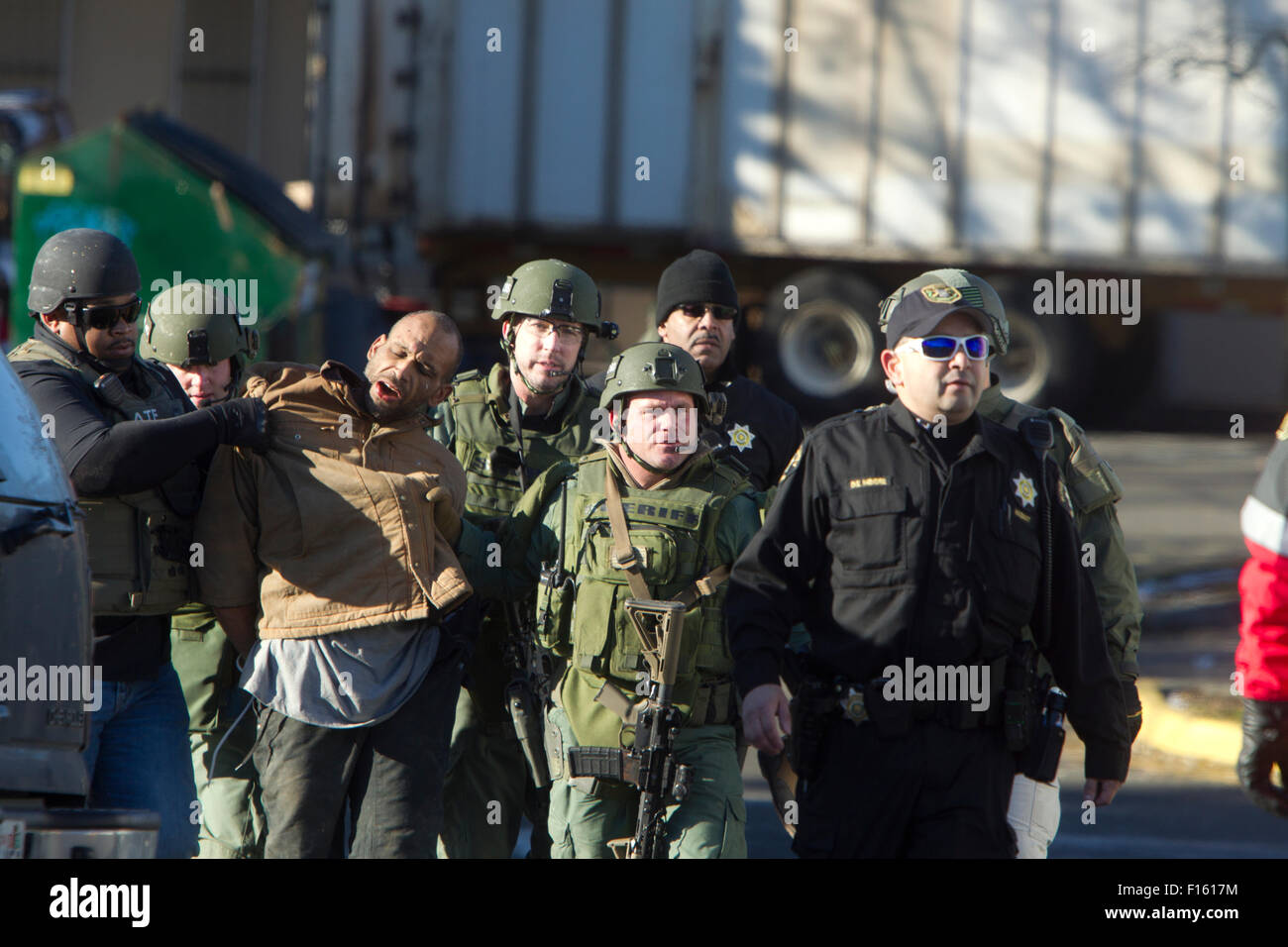 Swat team man arrested hi-res stock photography and images - Alamy