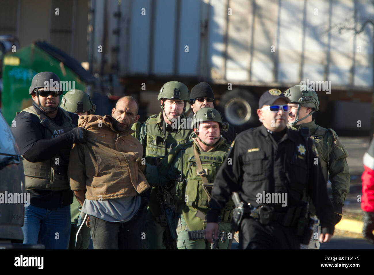 Swat team man arrested hi-res stock photography and images - Alamy