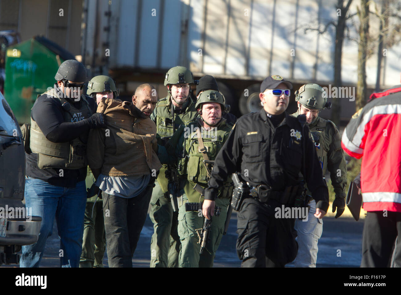 Swat team man arrested hi-res stock photography and images - Alamy