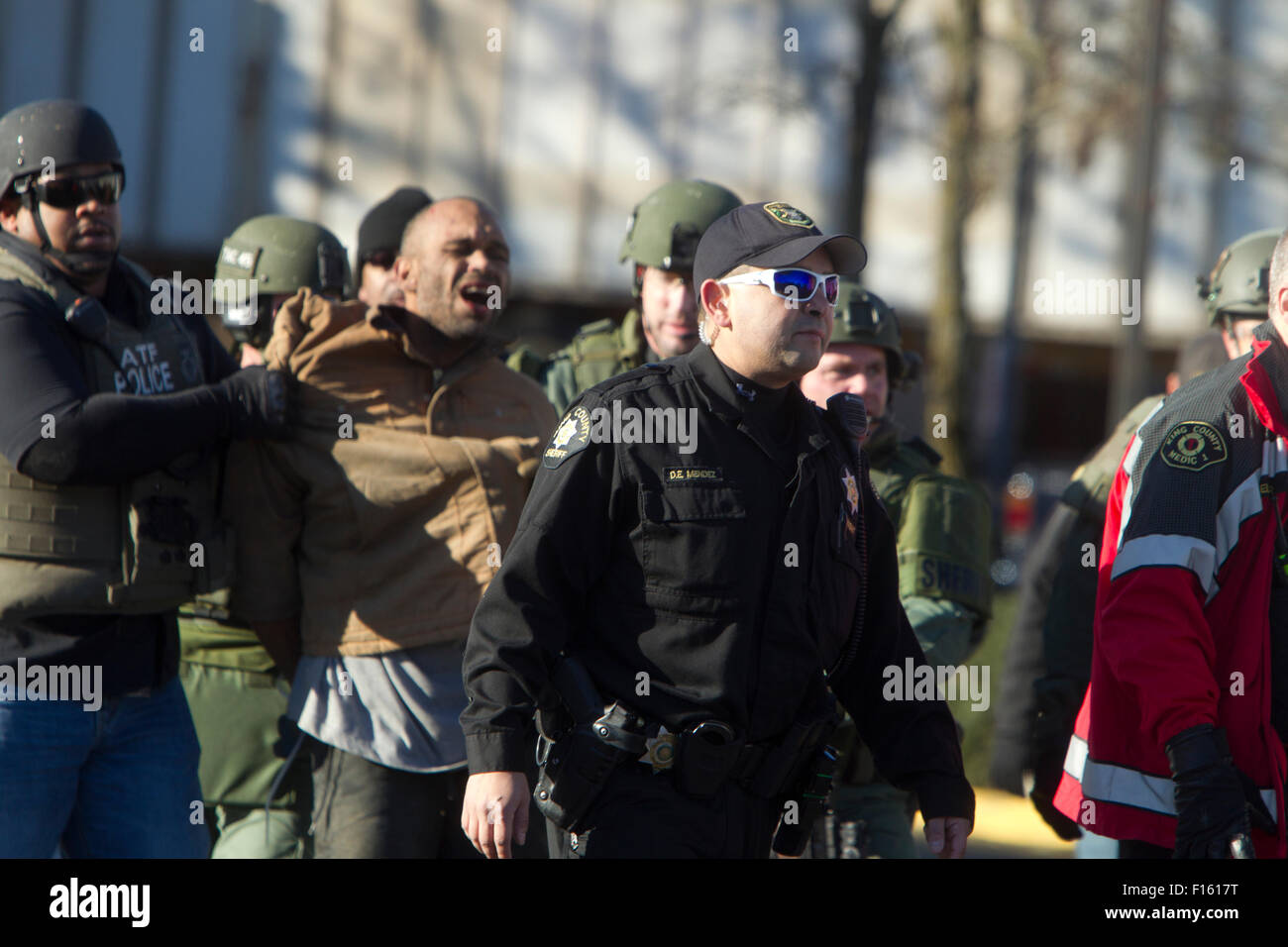 Swat team man arrested hi-res stock photography and images - Alamy