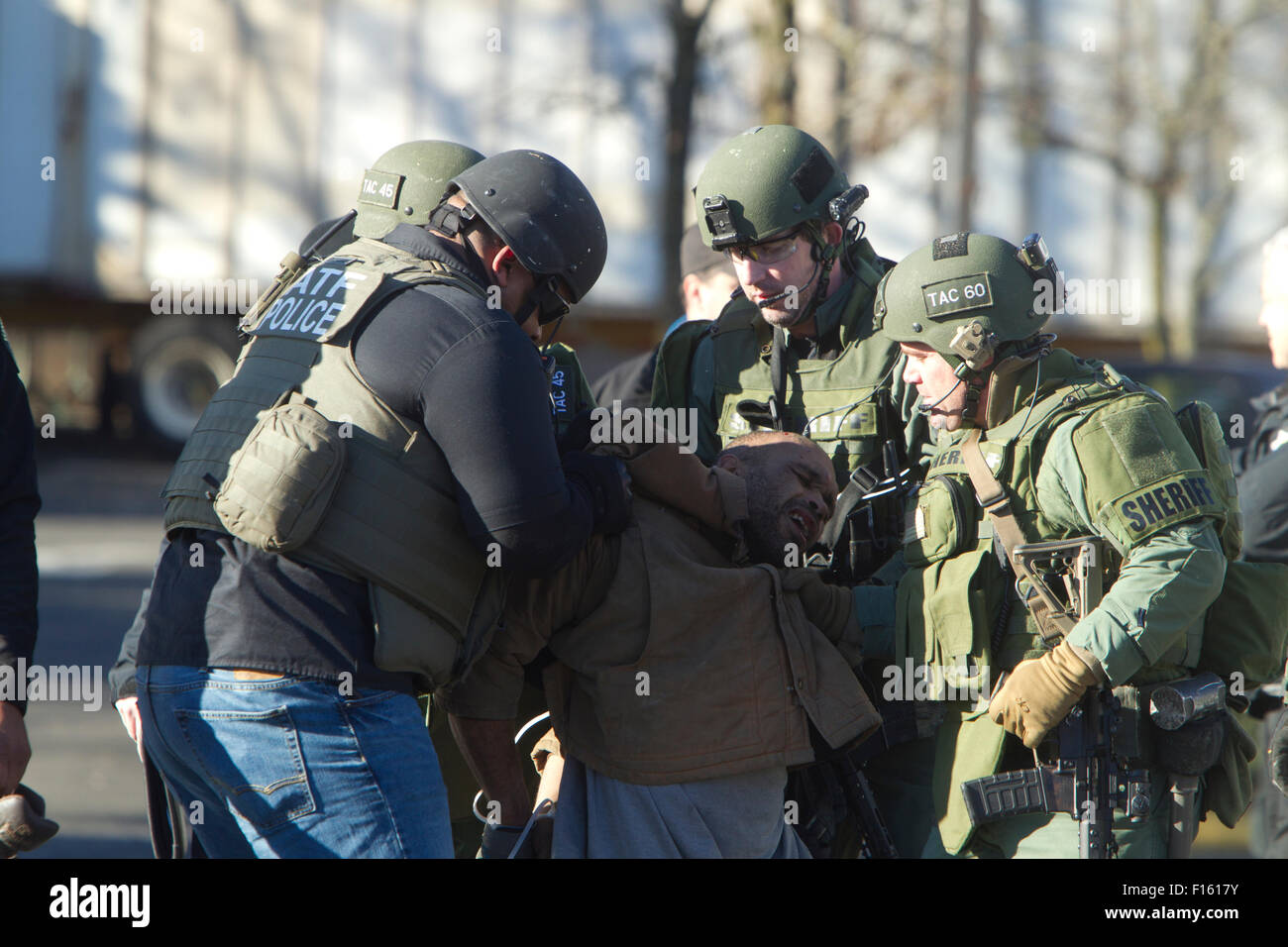Swat team man arrested hi-res stock photography and images - Alamy