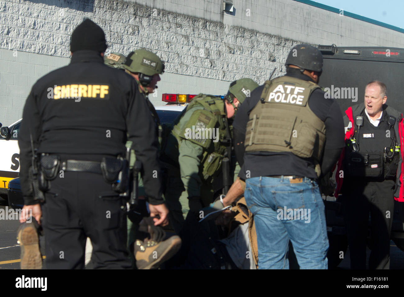 Swat team man arrested hi-res stock photography and images - Alamy